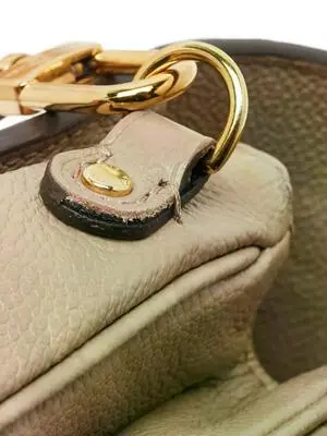 LOUIS VUITTON Pochette Métis Monogram Empreinte Handbag
