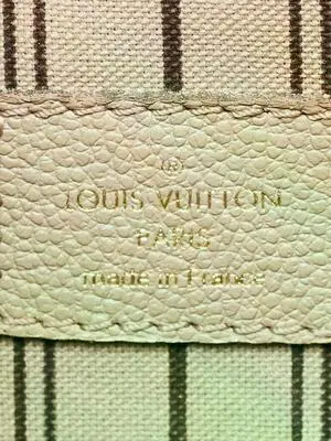 LOUIS VUITTON Pochette Métis Monogram Empreinte Handbag