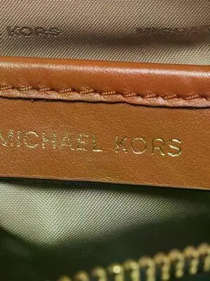 Michael Kors Mini Rhea Monogram Backpack
