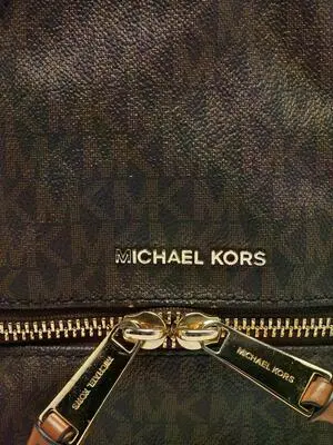 Michael Kors Mini Rhea Monogram Backpack