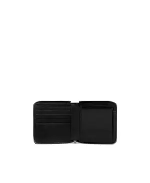 Celine Zipped Bi-fold Wallet In Grained Calfskin