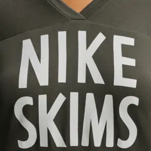 Nike Skims Stretch Knit V-neck Short-sleeve Top