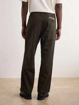 HUMAN MADE Tapered Logo-embroidered Pleated Cotton-twill Trousers