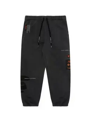 AAPE BY *A BATHING APE X Alpha Industries Moonface Logo-print Track Pants
