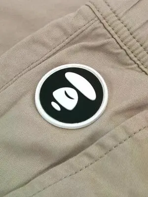 AAPE BY *A BATHING APE Moonface-patch Tapered Trousers