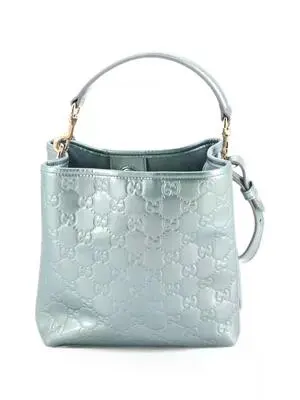 Gucci Emblem Gg Embossed Patent Small Bucket Bag