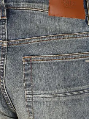 Amiri Mid-rise Straight Fit Distressed Stretch-denim Jeans