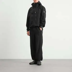 AND WANDER 2.5l Hiker Rain Jacket
