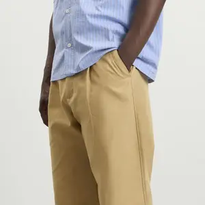 BOUND Wide Pleated Cotton Trousers