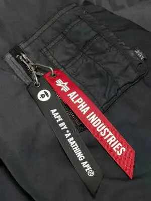 AAPE BY *A BATHING APE X Alpha Industries Moonface Reversible Bomber Jacket