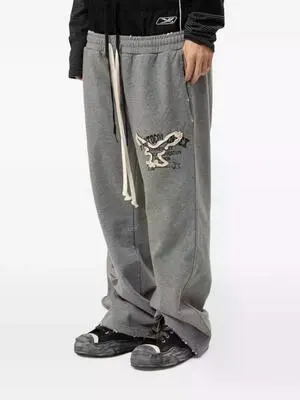 PROTOCOL INDEX Layered Eagle-patch Track Pants