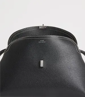 TOTEME Grained Leather T-lock Clutch Bag
