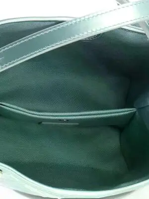 Gucci Emblem Gg Embossed Patent Small Bucket Bag