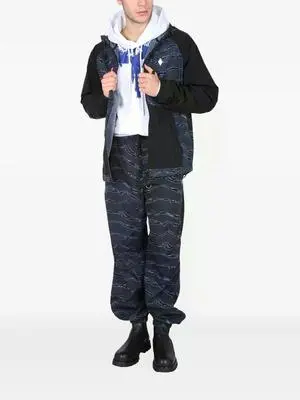MARCELO BURLON COUNTY OF MILAN Printed Trousers - Blue
