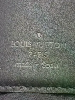 LOUIS VUITTON 2000-2026 Monogram Eclipse Reverse Discovery Wallet Small Wallets