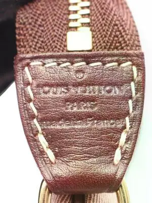 LOUIS VUITTON 2010 Monogram Mini Lin Pochette Shoulder Bag