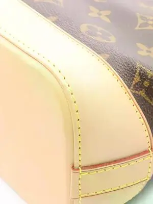 LOUIS VUITTON 2006 Lockit Monogram Handbag