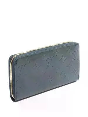 LOUIS VUITTON 2009 Monogram Zip Leather Wallet