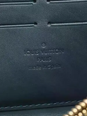 LOUIS VUITTON 2009 Monogram Zip Leather Wallet