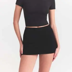 SKIMS The Essential Collection Mini Skort - Obsidian