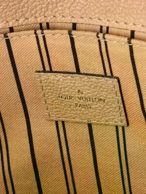 LOUIS VUITTON Pochette Metis Monogram Empreinte Leather Crossbody Bag - Neutrals