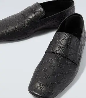 Gucci Gg Embossed Leather Loafers