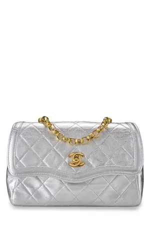 Chanel Quilted Lambskin Curved Flap