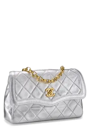 Chanel Quilted Lambskin Curved Flap