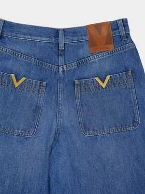 Valentino Garavani Denim Wide Leg Trousers With Cuffs