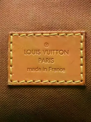 LOUIS VUITTON 2010 Gm Tivoli Monogram Tote Bag - Brown