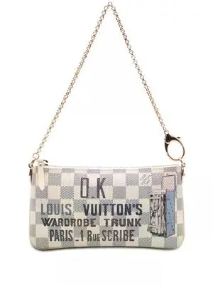 Louis Vuitton Silver Tone Clutches