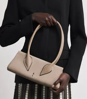 CHRISTIAN LOUBOUTIN Venus Leather Baguette Shoulder Bag - Beige