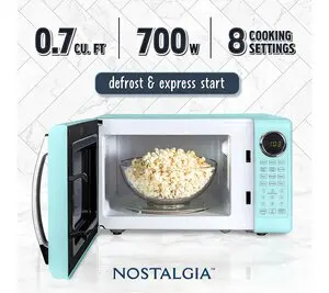 NOSTALGIA Retro 0.7 Cu. Ft. Countertop Microwav E