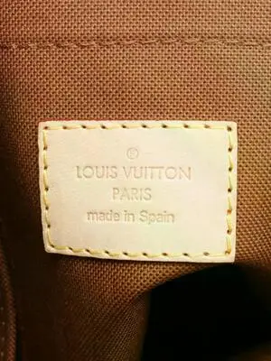 LOUIS VUITTON 2011 Monogram Odeon Pm