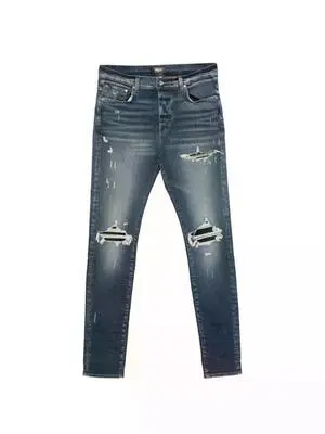 Amiri Ripped-effect Jeans