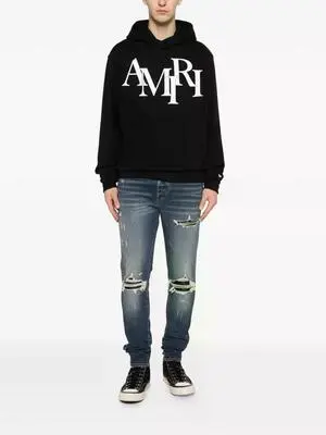 Amiri Ripped-effect Jeans