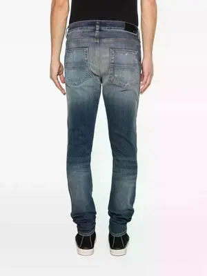 Amiri Ripped-effect Jeans
