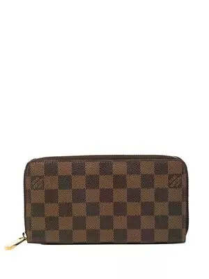 LOUIS VUITTON 2010 Damier Ebene Zippy Wallet Long Wallets - Brown