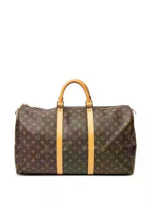 Louis Vuitton Gold Tone Travel Bags