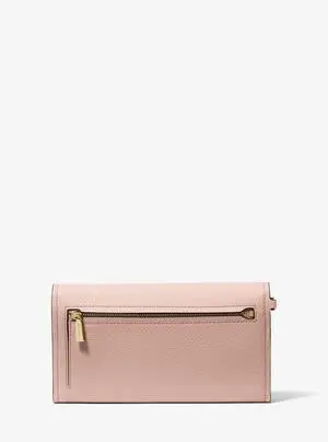 Michael Kors Jet Set Medium Pebbled Leather Smartphone Wristlet In By - Pink