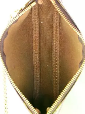LOUIS VUITTON Pochette Accessoires Monogram Canvas Mini Clutch - Brown