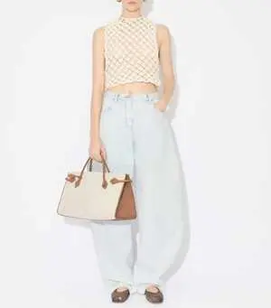 Alaïa Round Wide-leg Jeans