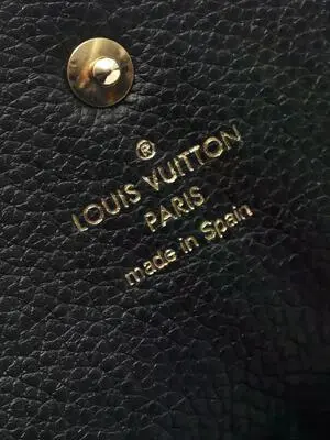 LOUIS VUITTON 2014 Curieuse Monogram Wallet