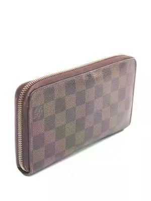 LOUIS VUITTON 2012 Damier Ebene Zippy Wallet - Brown