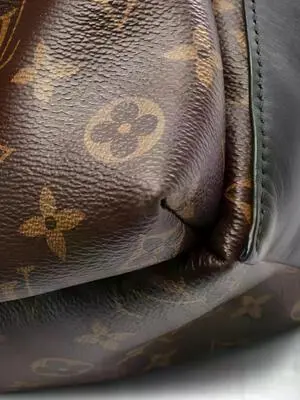 LOUIS VUITTON 2010s Discovery Monogram Leather Backpack