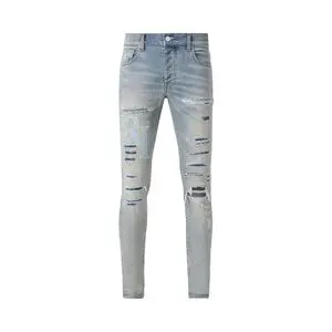 Amiri Staggered Logo Jean