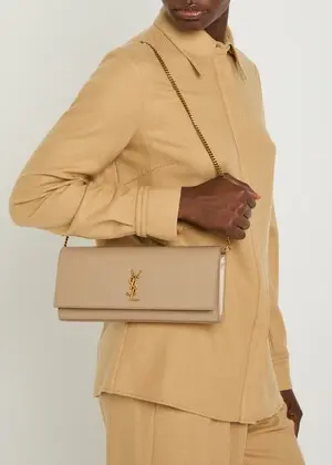 Saint Laurent Kate Pebbled Leather Clutch - Beige
