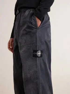 Stone Island Tapered Logo-appliquéd Reflective Nylon Trousers