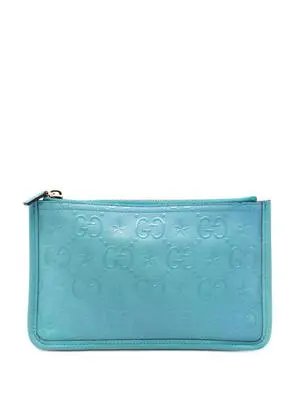 Gucci Embossed Clutches