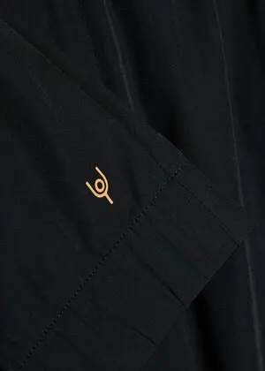 NOW YOU LIVE Saxby Tapered-leg Shell Sweatpants - Black